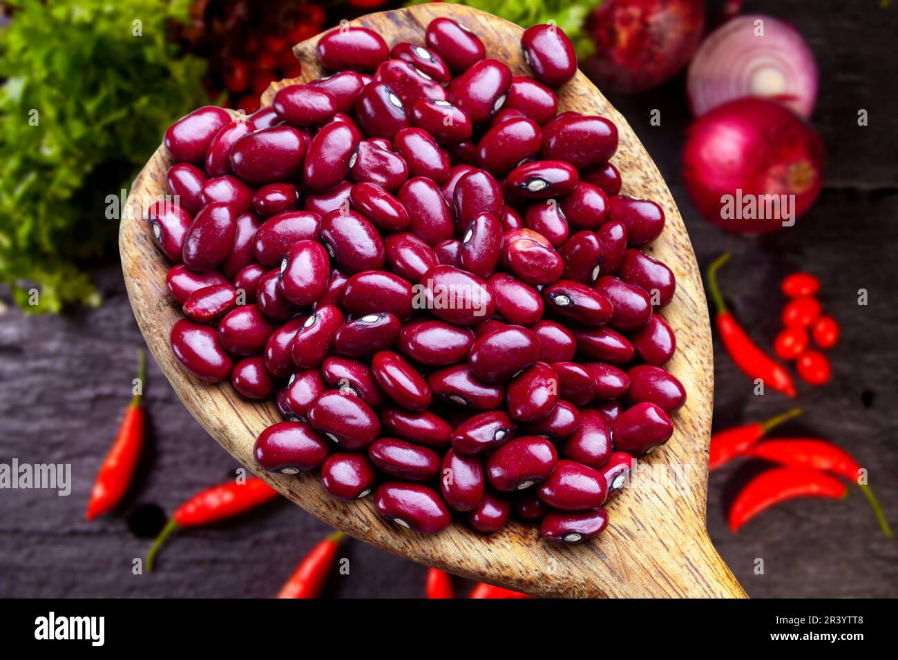 red bean wooden spoon Stock Photo - Alamy