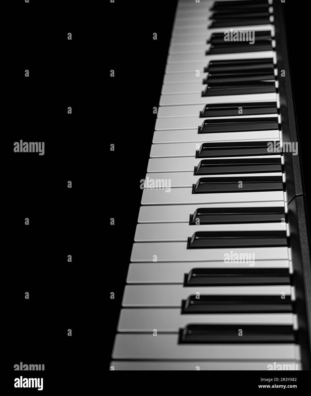 Keyboard synthesizer on a dark background Stock Photo - Alamy