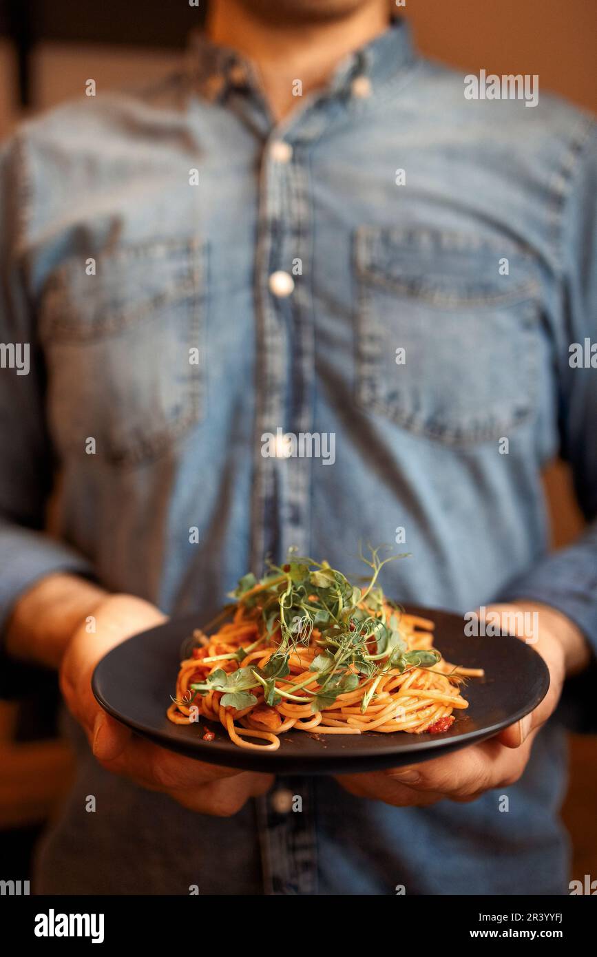 Man eating pasta home hi-res stock photography and images - Alamy