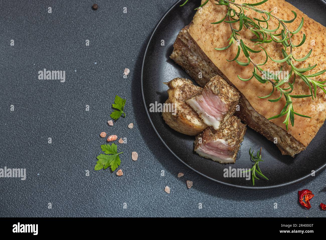 Pieces of salty high-fat meat cooked with spices. Salo, bacon, lard ...
