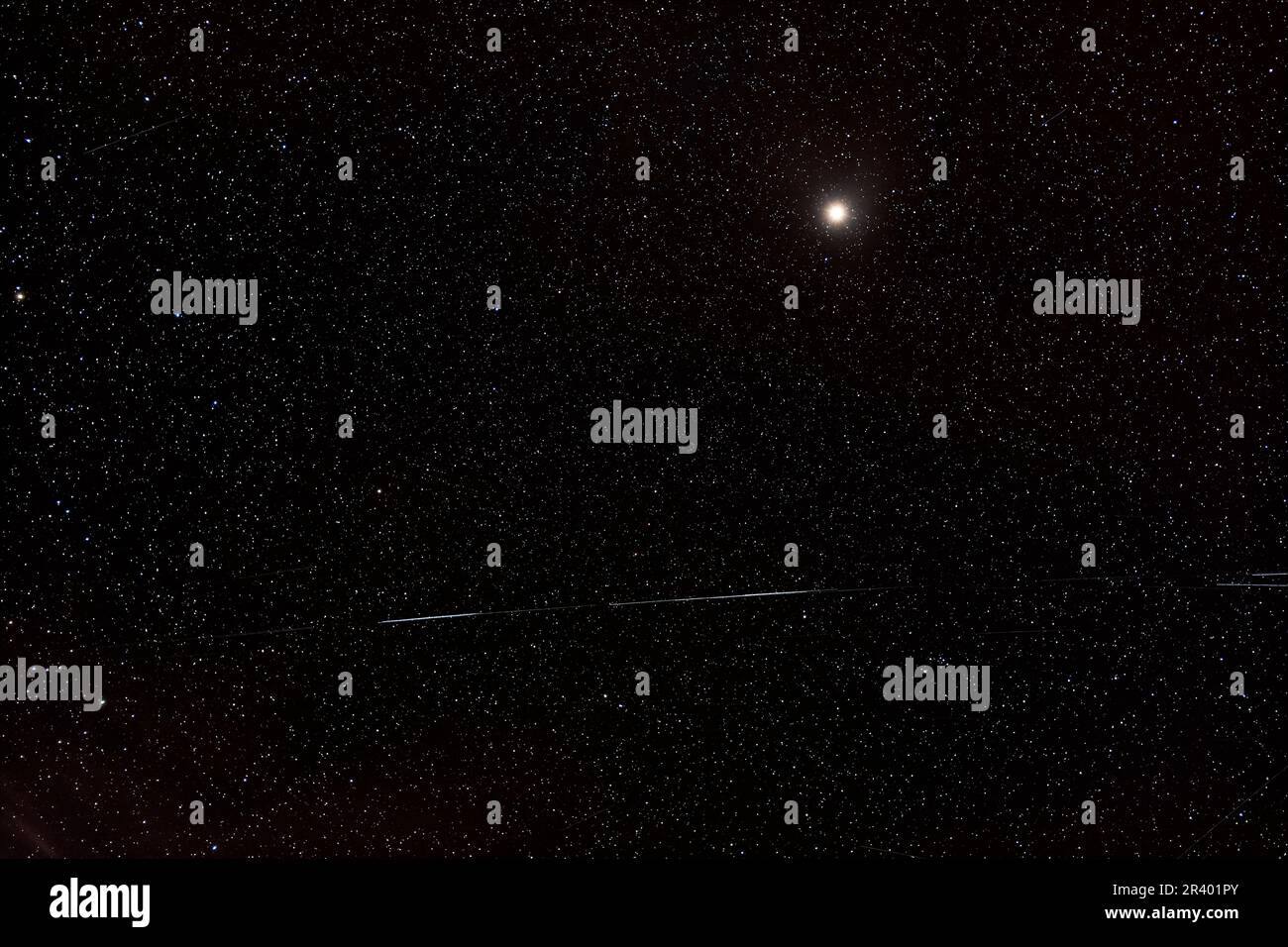 Geosat trails flaring below Mars Stock Photo - Alamy