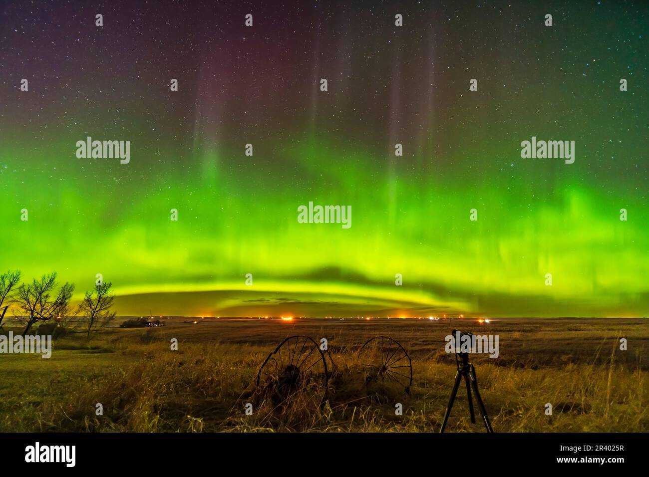 Northern light display with photography setup in foreground, Alberta ...