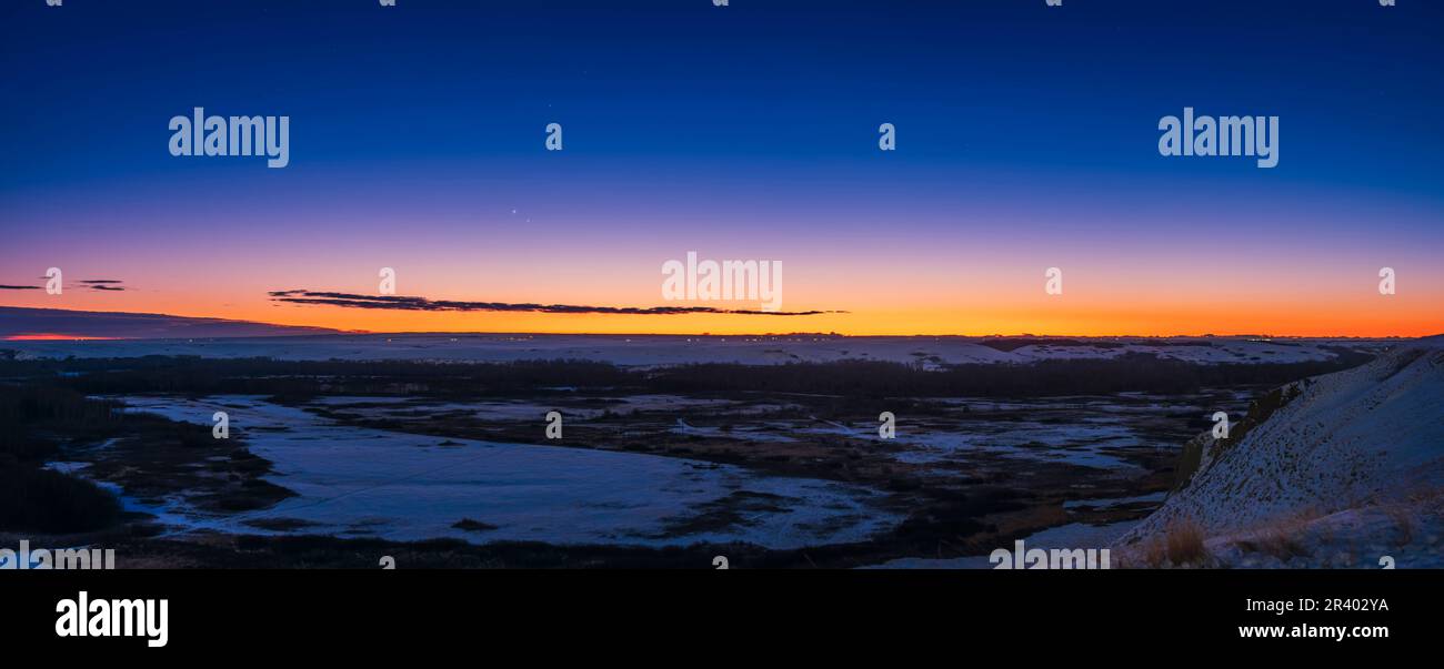 The close pairing of Jupiter and Saturn in the evening twilight over ...
