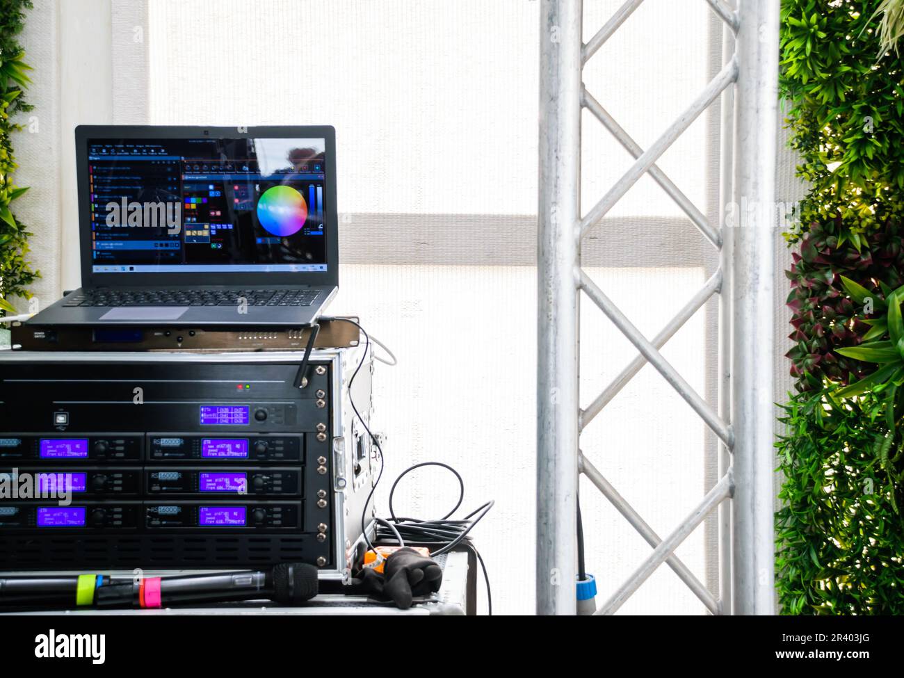 Image of sound and light system with laptop, microphones and DJ mixers ...