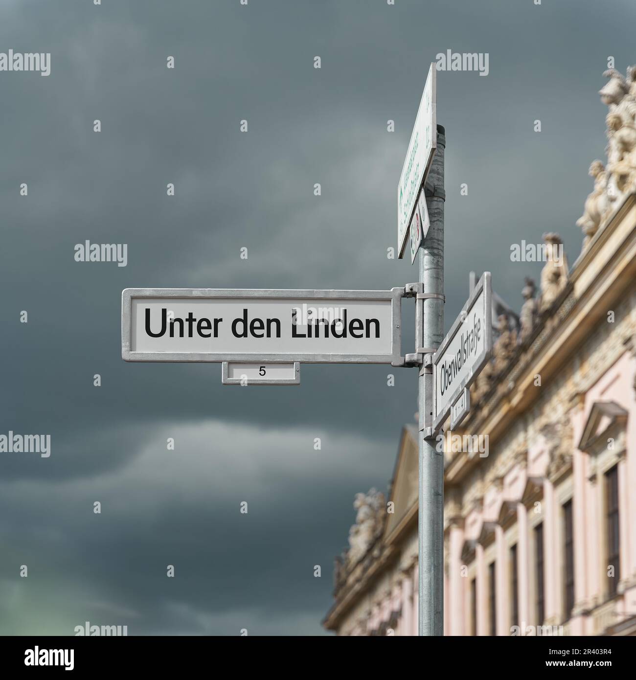 Street sign Unter den Linden in Berlin. In the background the German ...