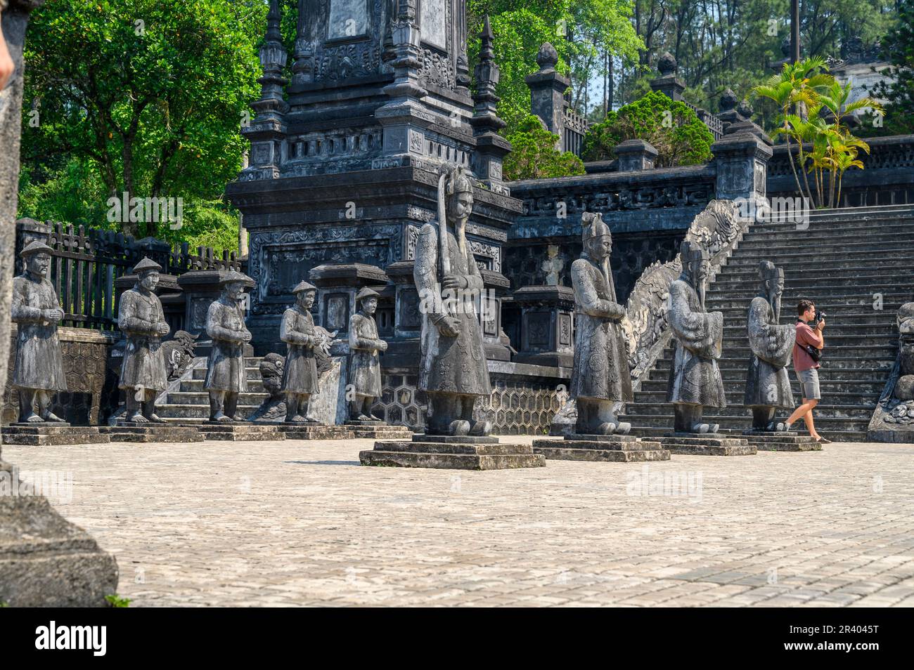 Stone statues of Mandarin soldiers guarding the tomb of Emperor Khai ...