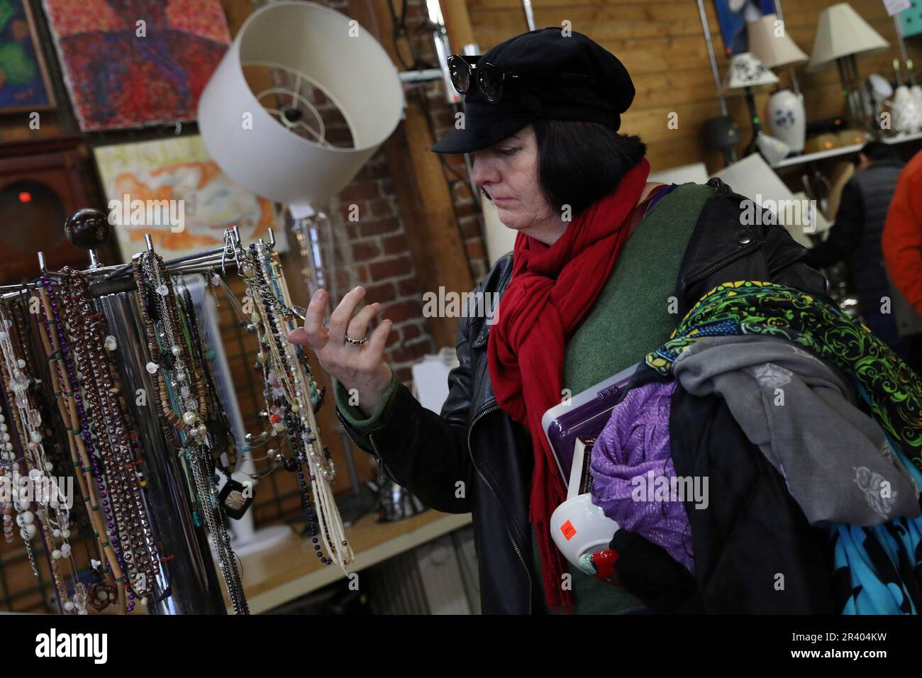 Michele Simmerer of San Francisco looks over some jewelery while ...