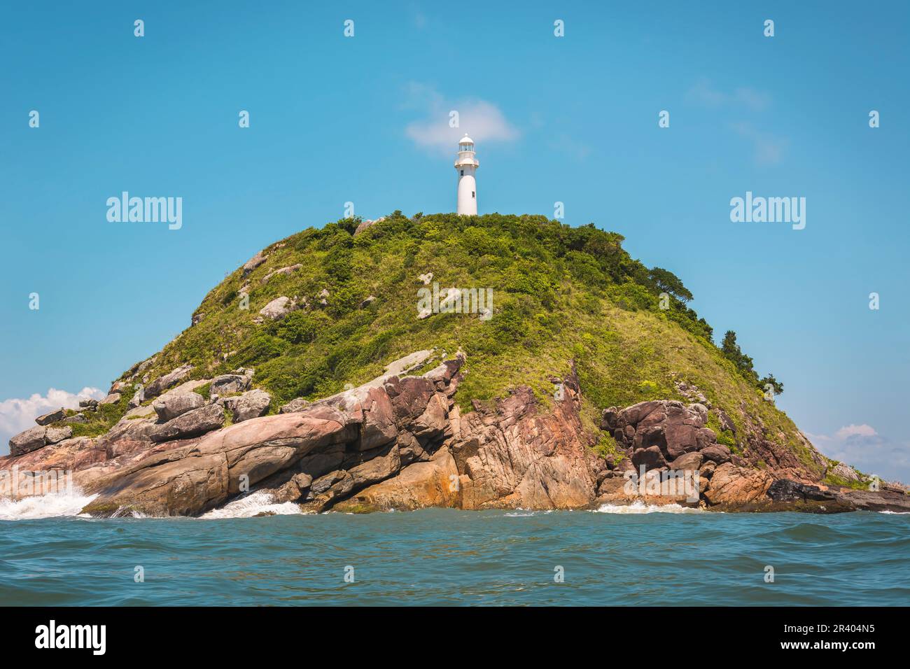 A lighthouse located on an island in southern Brazil. Guide for boats ...
