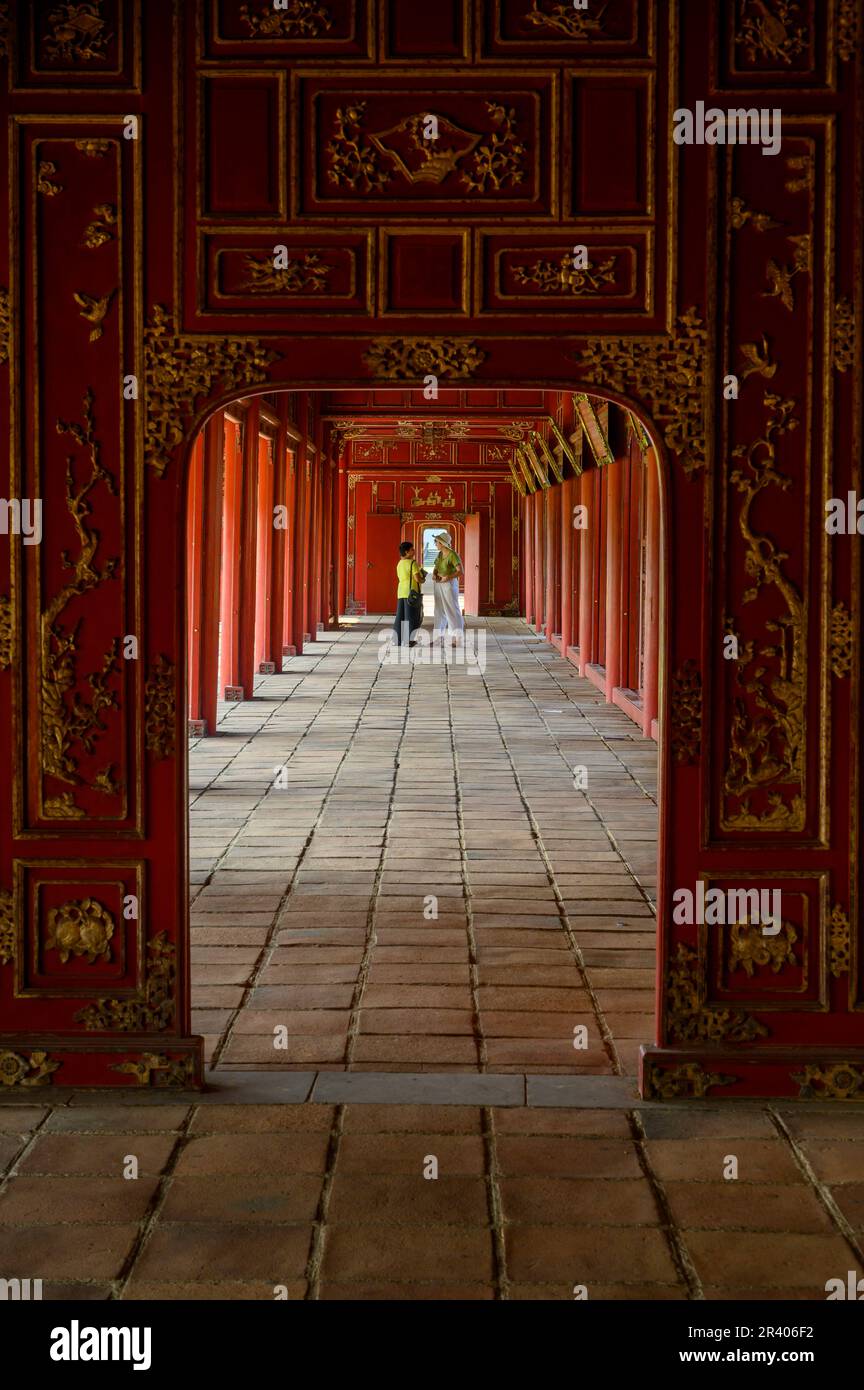 Long gold and red painted galleries of Can Chanh Palace in the Citadel ...