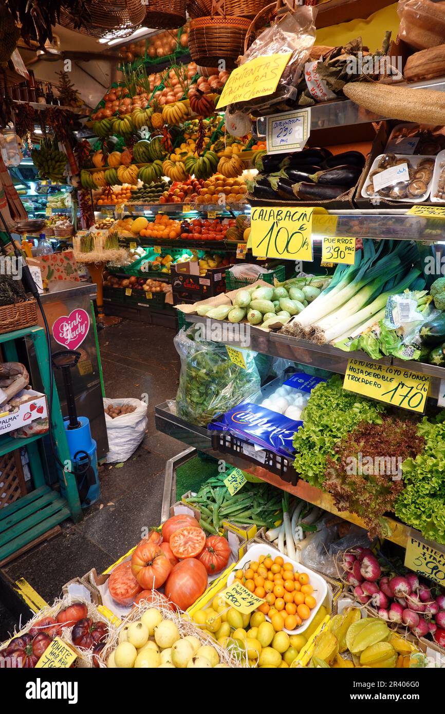 Overwhelming offer of fruits and vegetables in the market hall Mercado ...