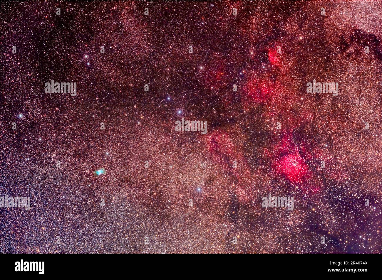 The field in Vulpecula containing the Dumbbell Nebula, NGC 6820 and small star clusters Stock ...