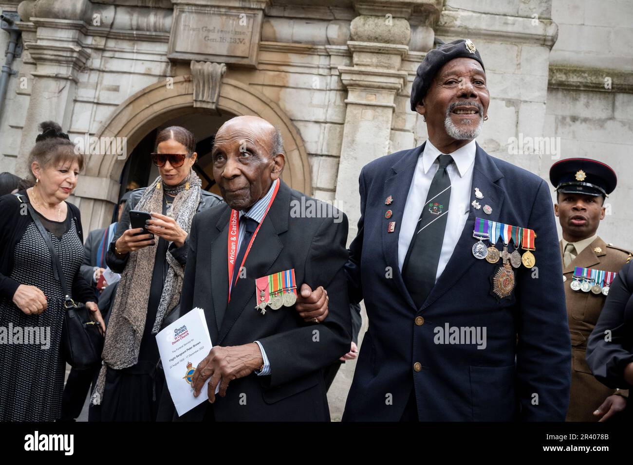 Friends, service personnel and members of the Caribbean community ...