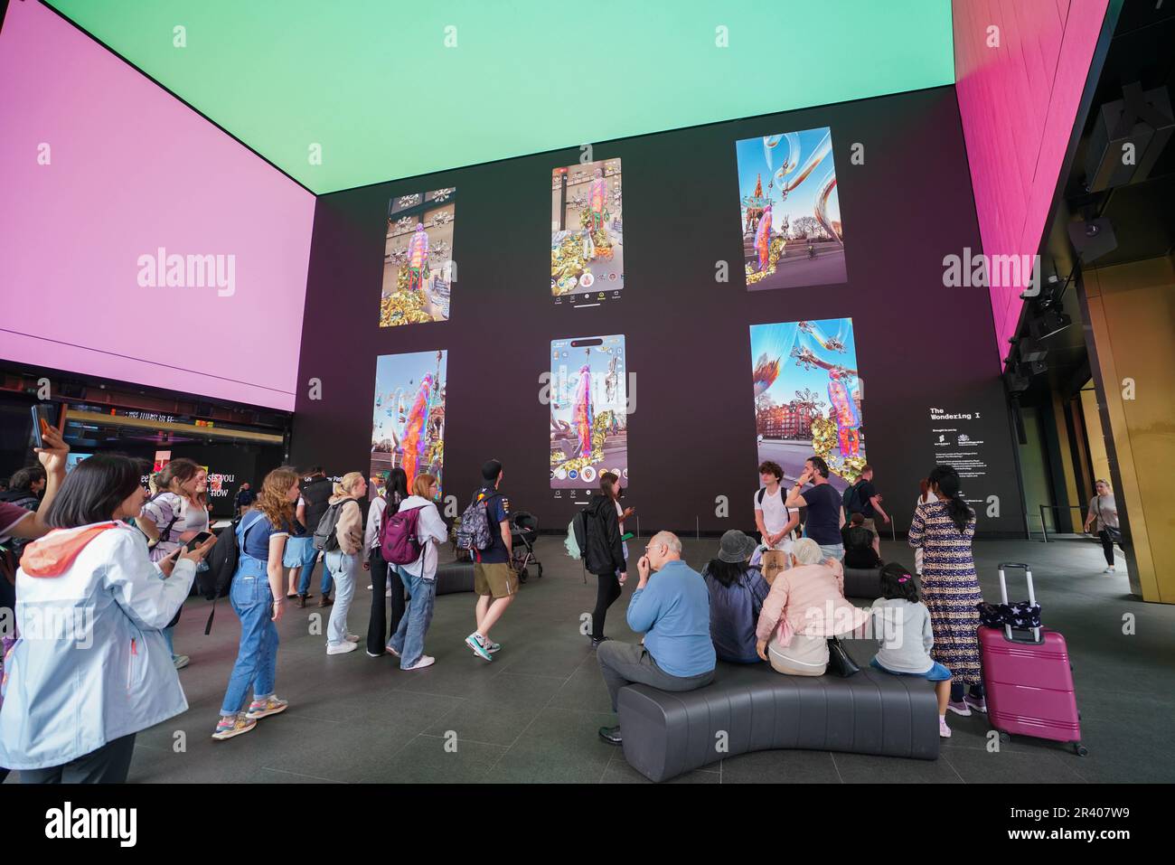 London UK. 25 May 2023 People interact with the large digital at the ...