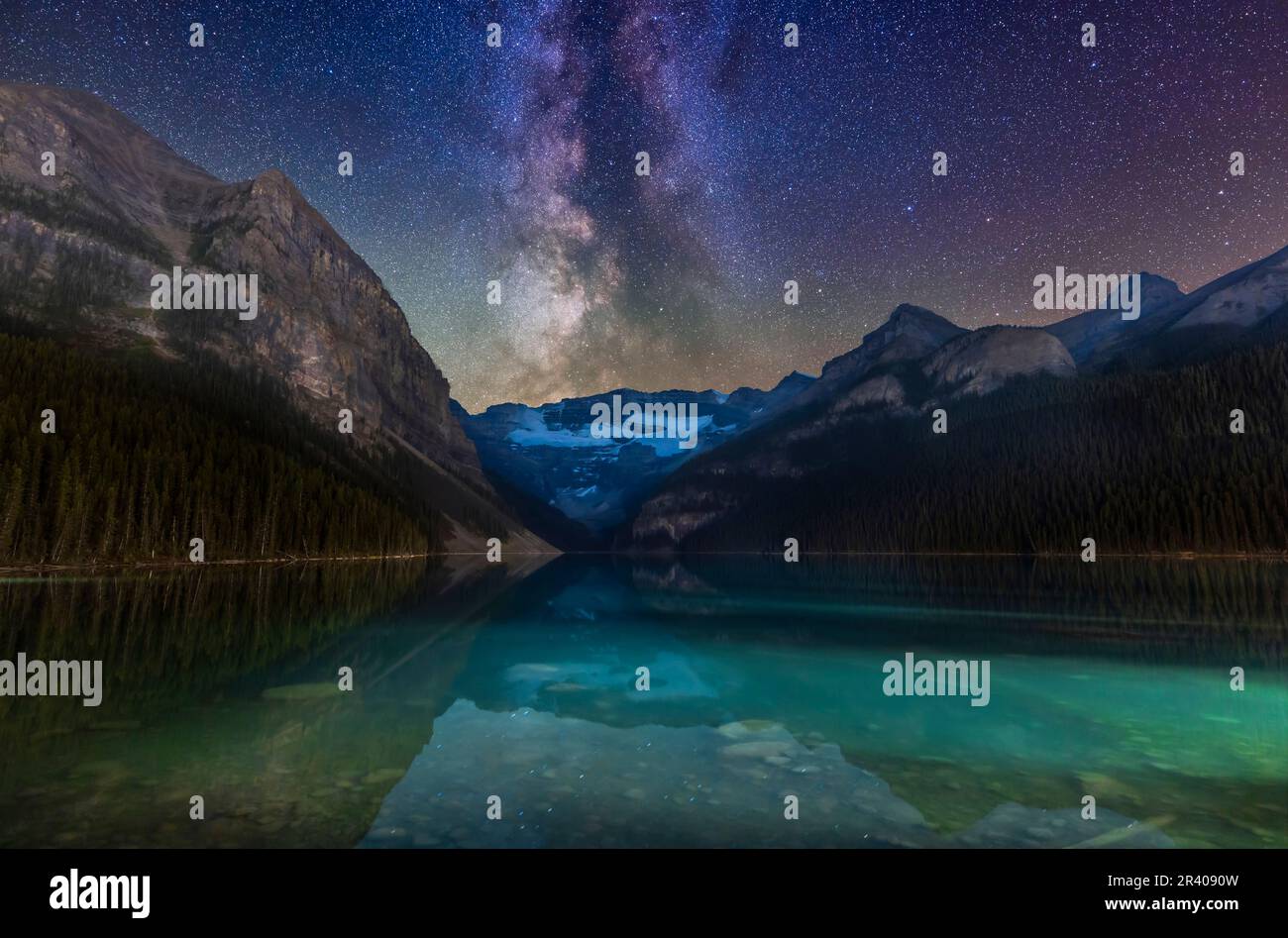 The Milky Way over glacier-fed Lake Louise and Victoria Glacier in ...