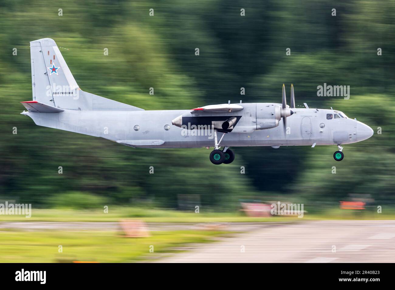 An An-26 military transport airplane of the Russian Air Force landing ...