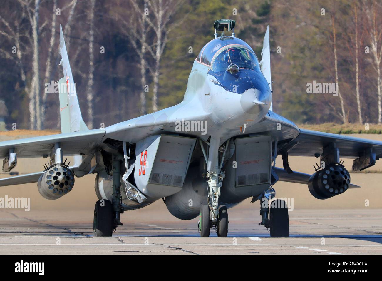 A MiG-29UB jet fighter of the Russian Air Force on flight line in ...