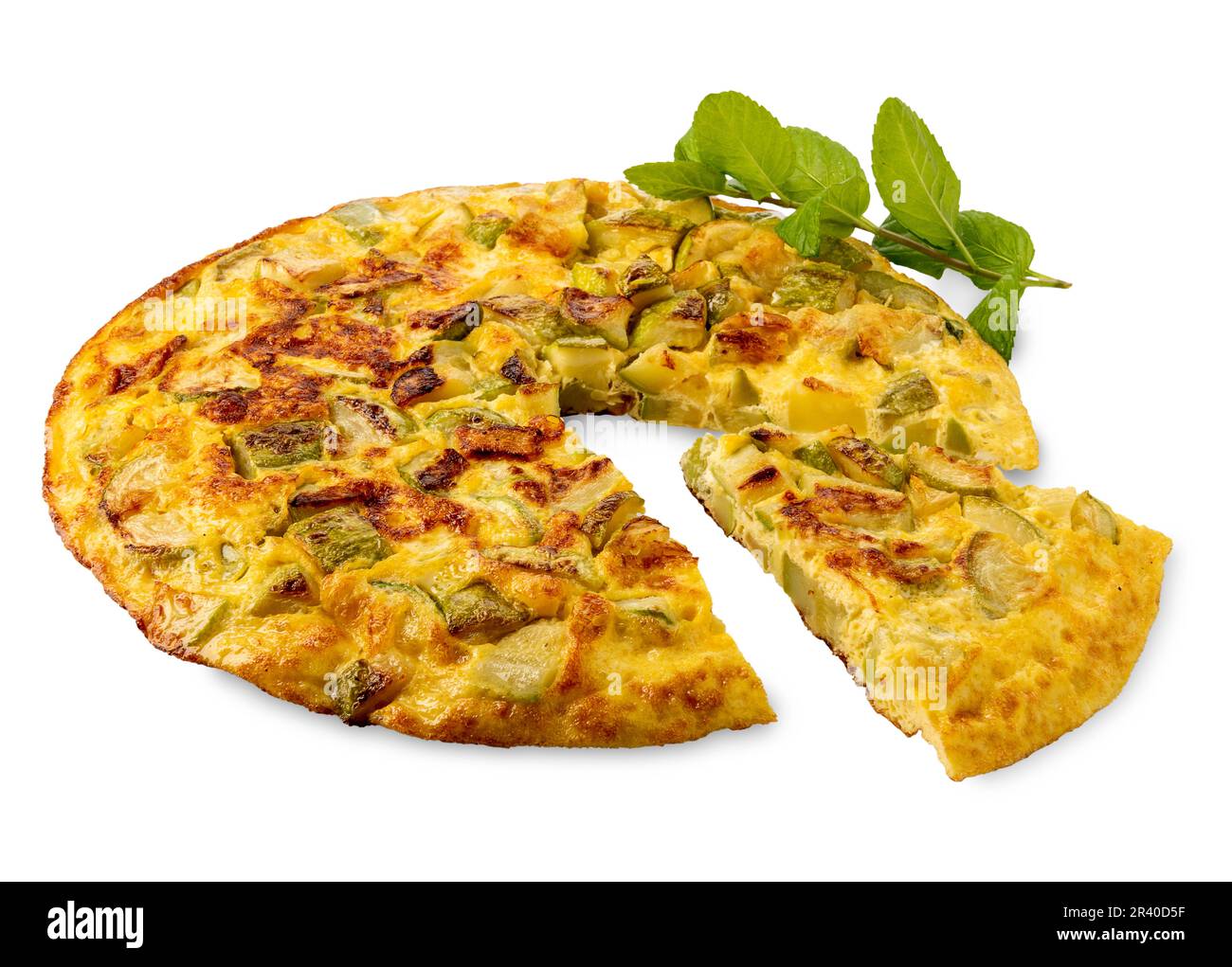 Omelet with zucchini with mint forges, whole omelet with cut slice ...