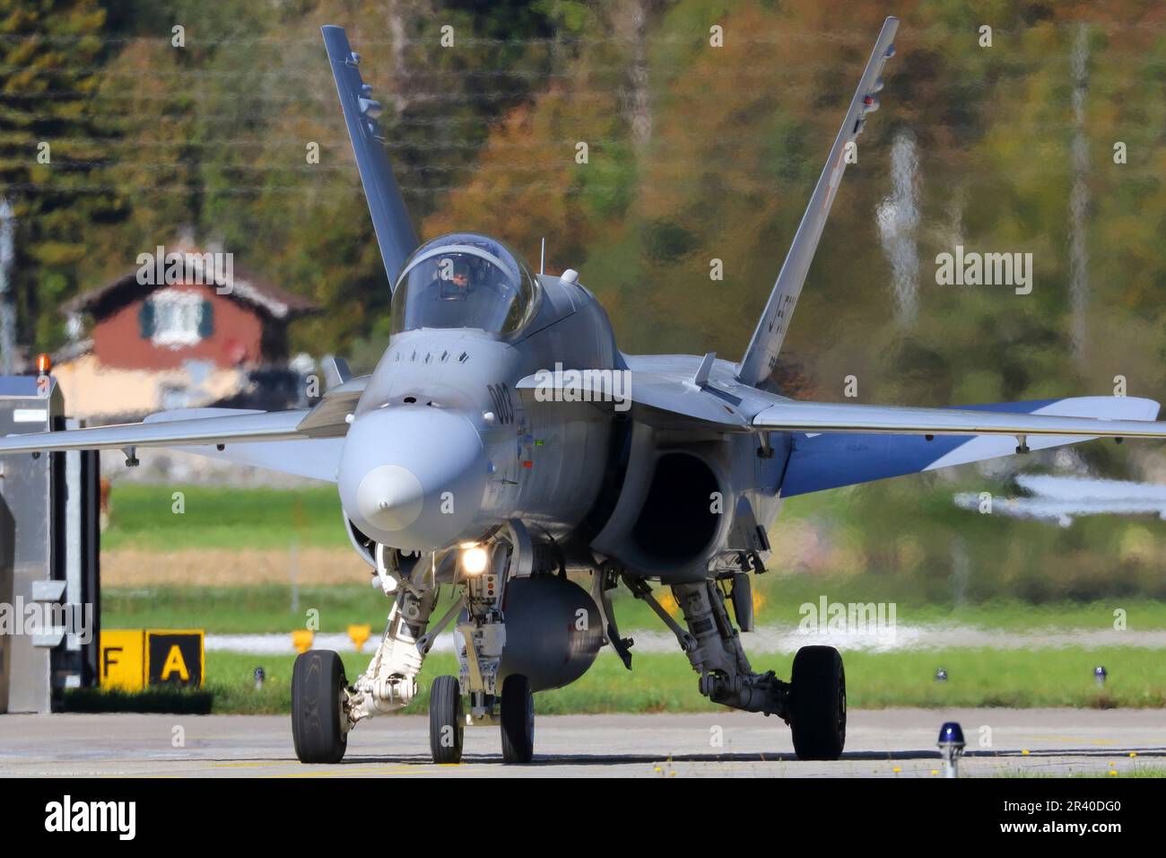An F/A-18C Hornet jet fighter of the Swiss Air Force taxiing at an ...