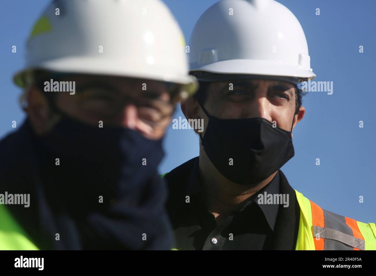 Foster City Mayor Sanjay Gehani (right) and City Manager Peter Pirnejad ...