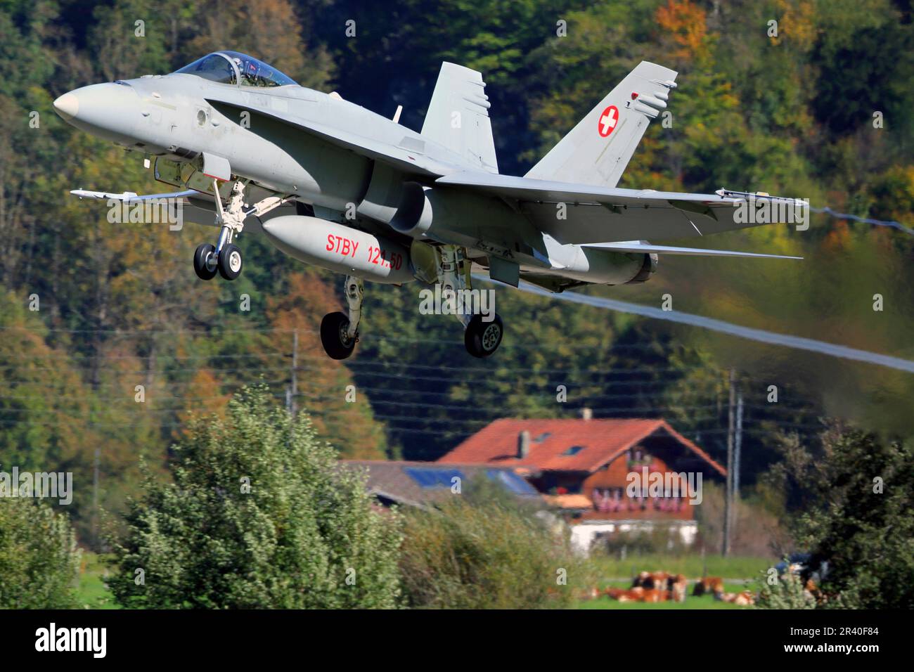 An F/A-18C Hornet jet fighter of the Swiss Air Force taking off ...