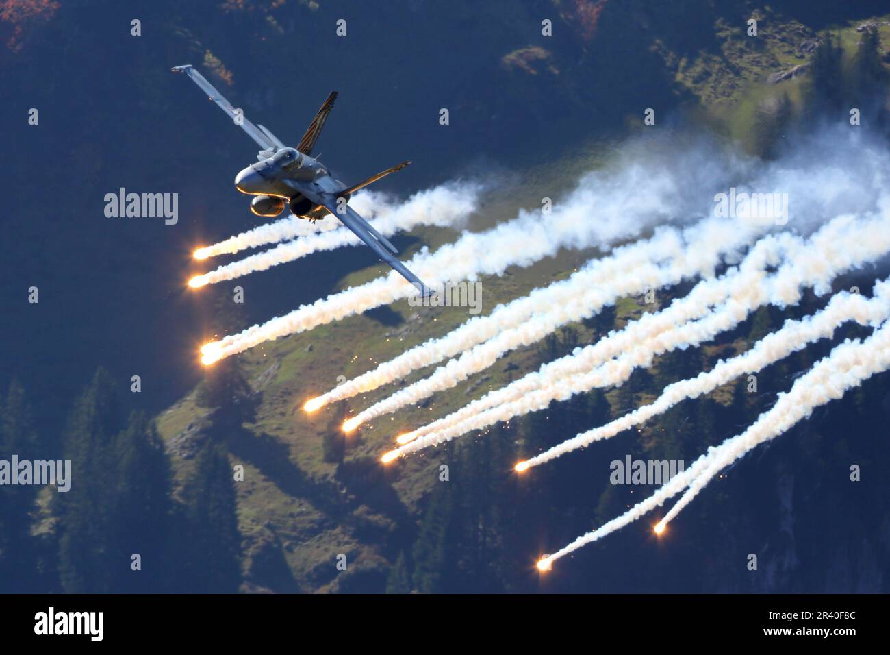 F/A-18C Hornet jet fighter of the Swiss Air Force releasing flare ...