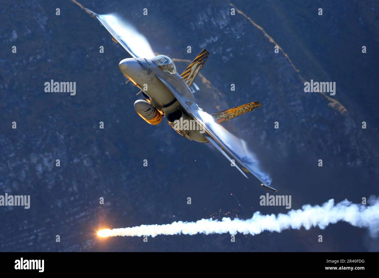 F/A-18C Hornet jet fighter of the Swiss Air Force releasing flare ...