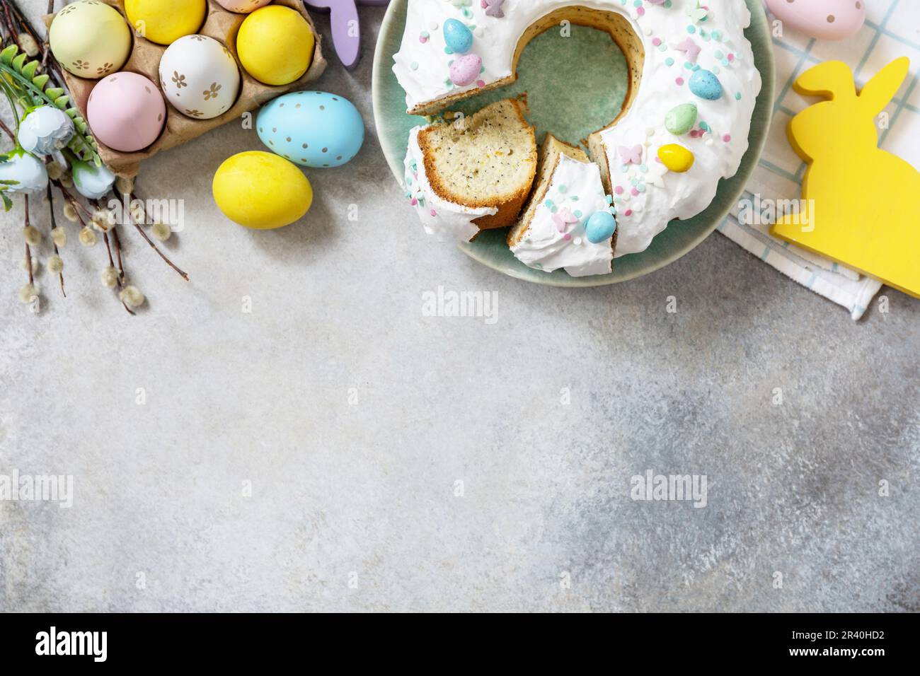 Glazed easter lemon cake decorated with confectionery and mini ...
