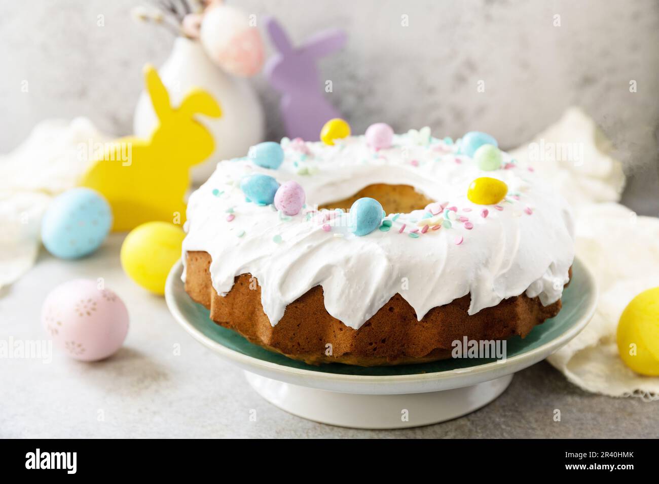 Glazed easter lemon cake decorated with confectionery and mini ...