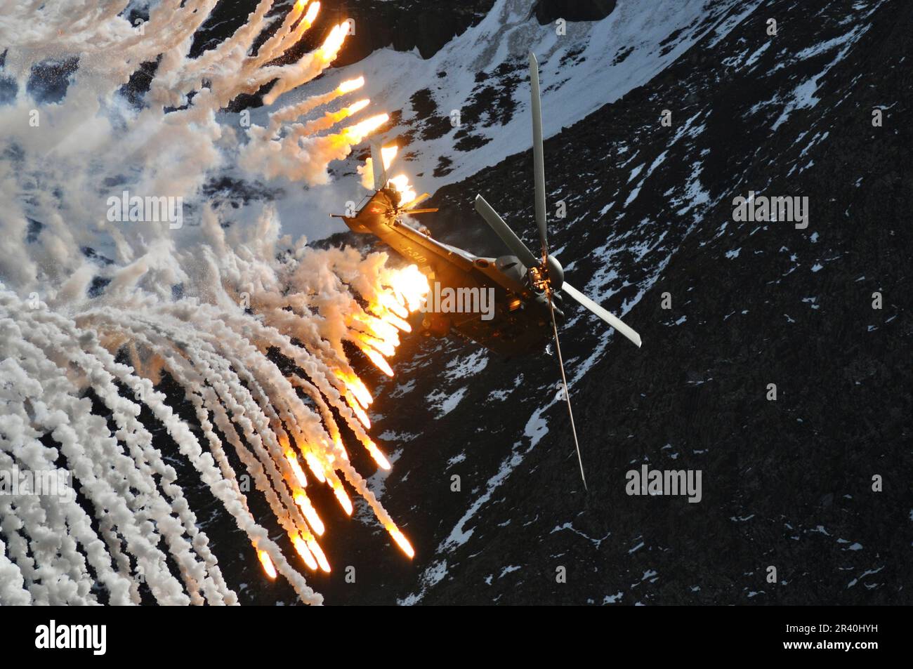 Swiss Air Force Super Puma helicopter launching flares, Switzerland ...
