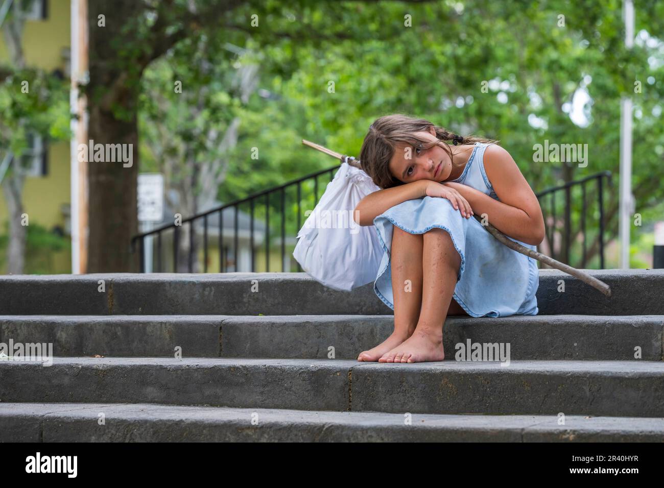 A Hungry Homeless Abandoned Runaway Child Looks For Food And Shelter In ...
