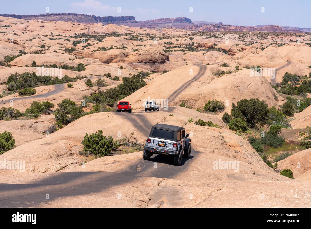 Jeeps on the Fins & Things OHV Trail over sandstone domes in the Sand ...