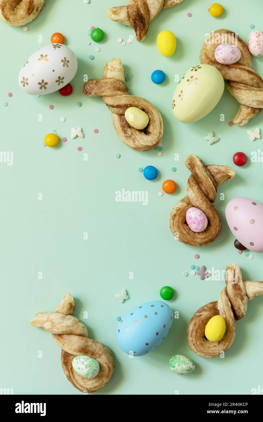 Happy Easter Holidays. Colors Easter eggs with Easter rabbit-shaped ...