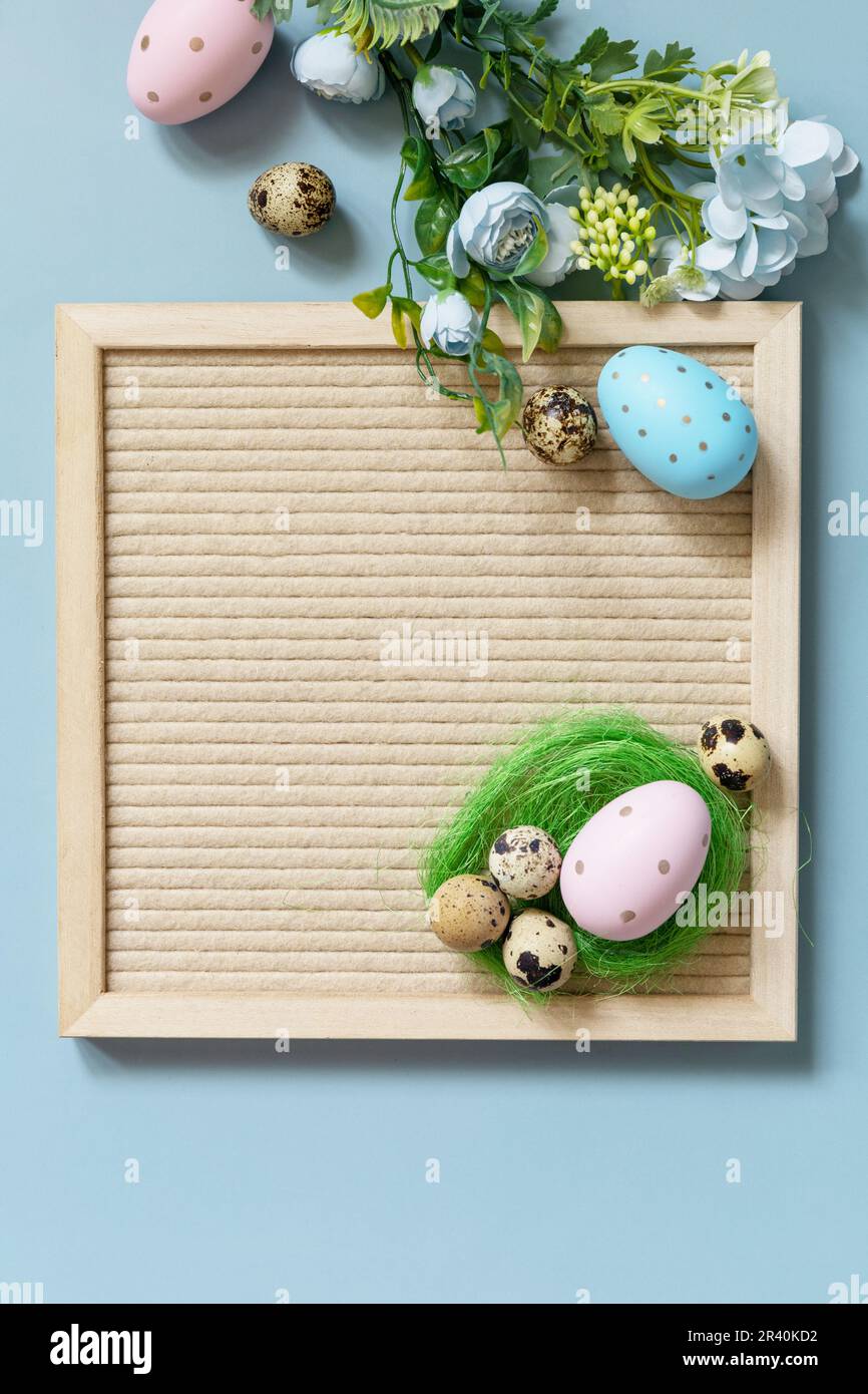 Springtime welcome concept. Letter board, Easter eggs and spring ...