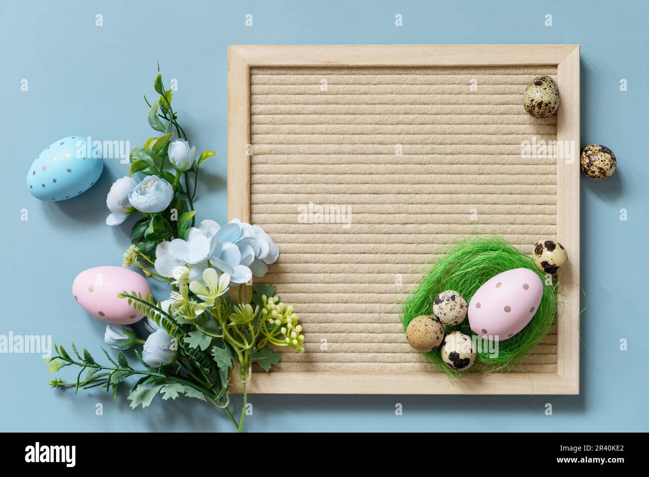 Springtime welcome concept. Letter board, Easter eggs and spring ...