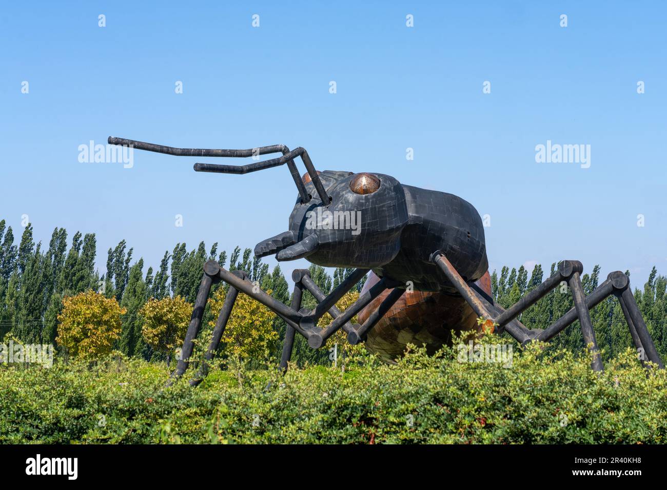 Metal sculpture of a giant ant in the vineyard of the Huentala Winery ...