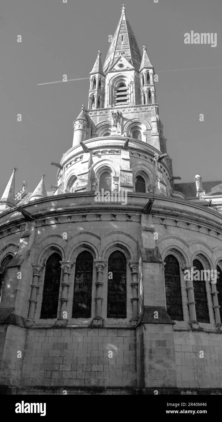 The tall Gothic spire of an Anglican church in Cork, Ireland. Neo ...