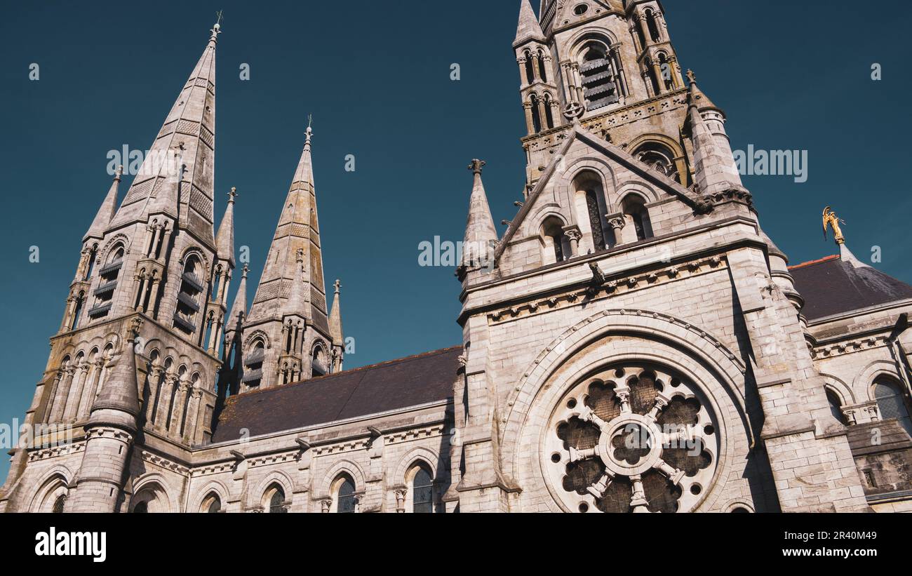 The spires of the Anglican Cathedral of St. Fin Barre in the Irish city ...