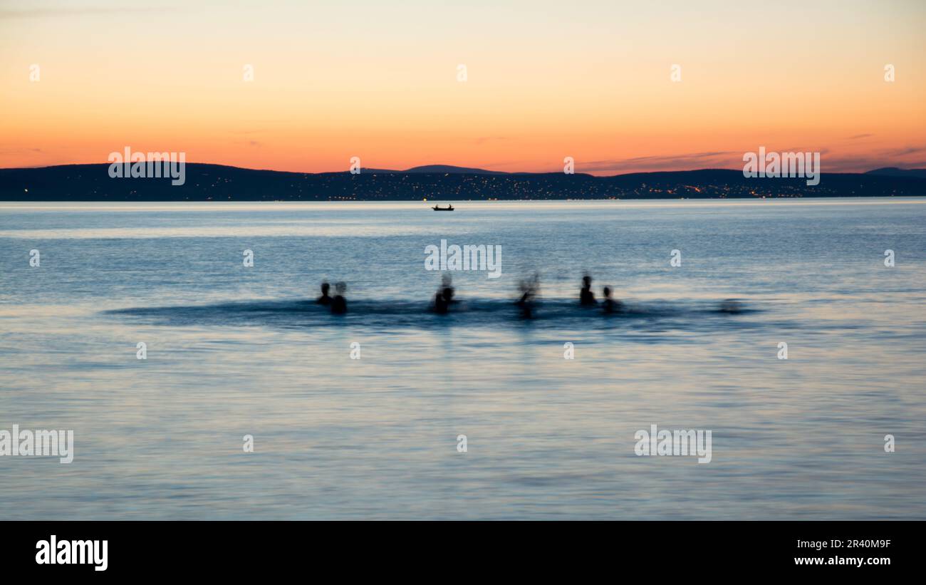 Bathers float hi-res stock photography and images - Alamy
