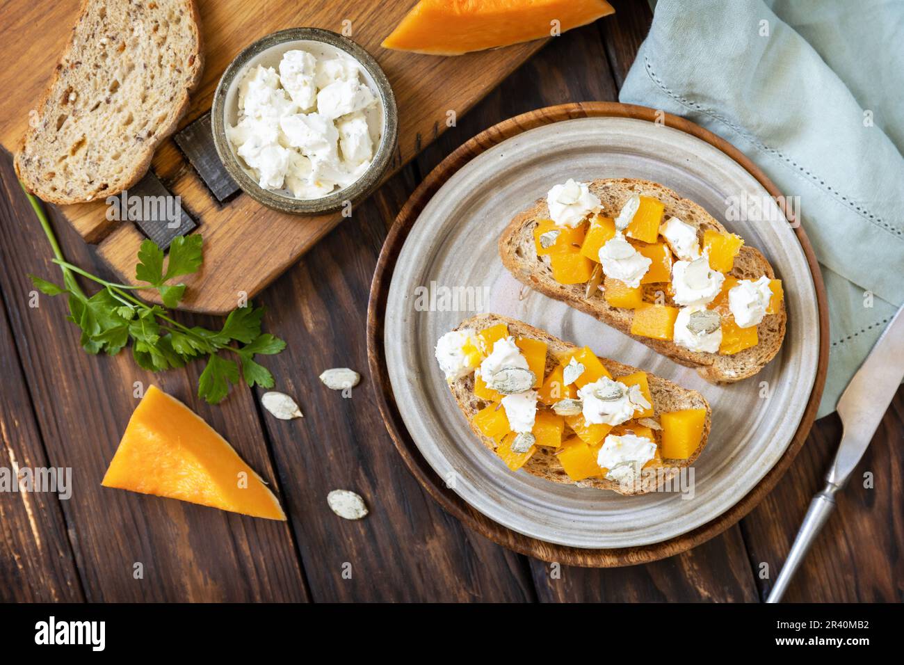 Healthy food, vegetarian appetizer on a rustic table. Open sandwiches ...