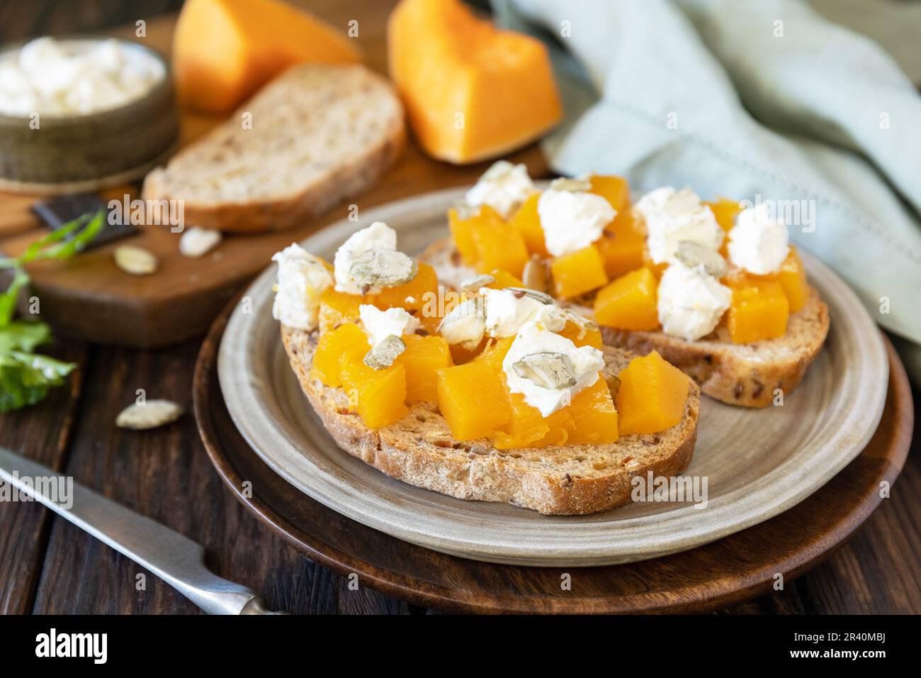 Healthy food, vegetarian appetizer on a rustic table. Open sandwiches ...