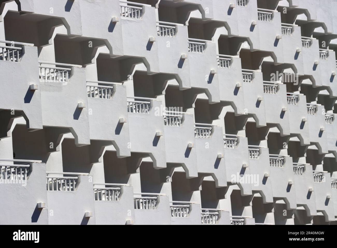 Monotonous hotel facade with balconies arranged in a row Stock Photo ...