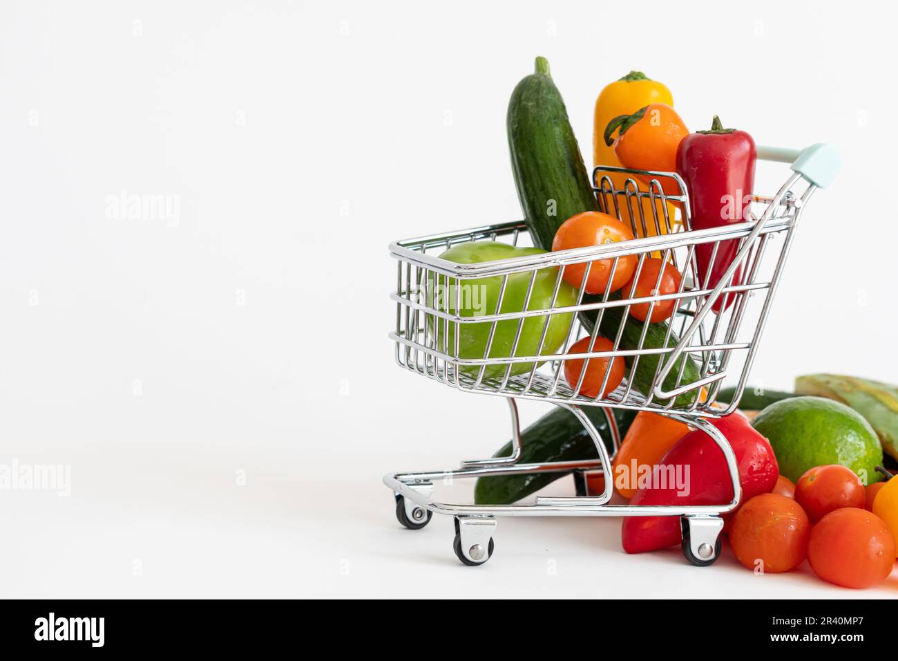 Shopping cart full of vegetables. Vegan food, healthy diet. White ...