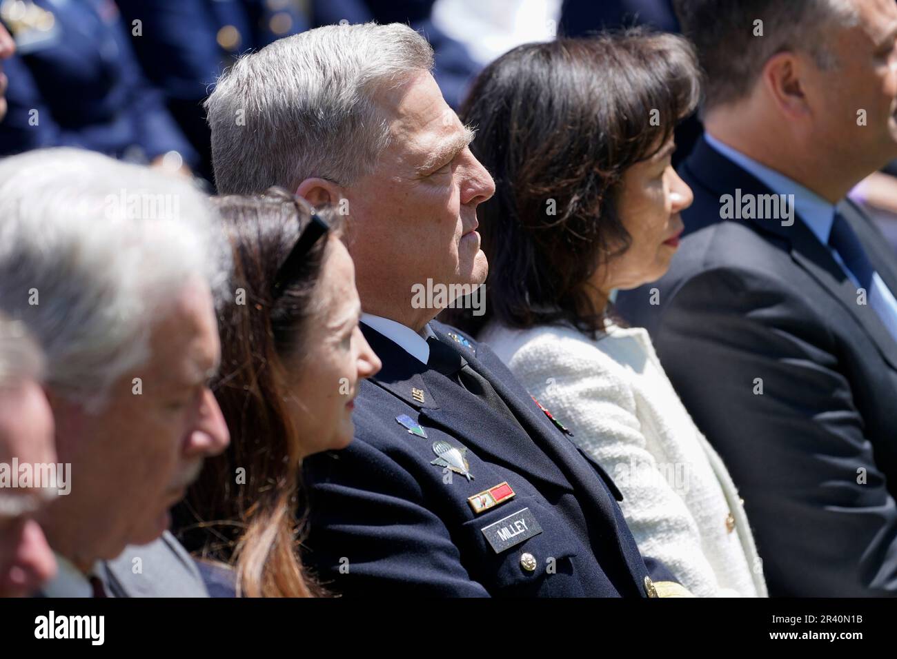 Chairman of the Joint Chiefs of Staff Gen. Mark Milley listens as ...
