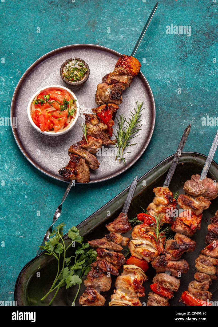 Bbq grilled meat pork and vegetable skewers on gray plate . Top view, flat lay Stock Photo - Alamy