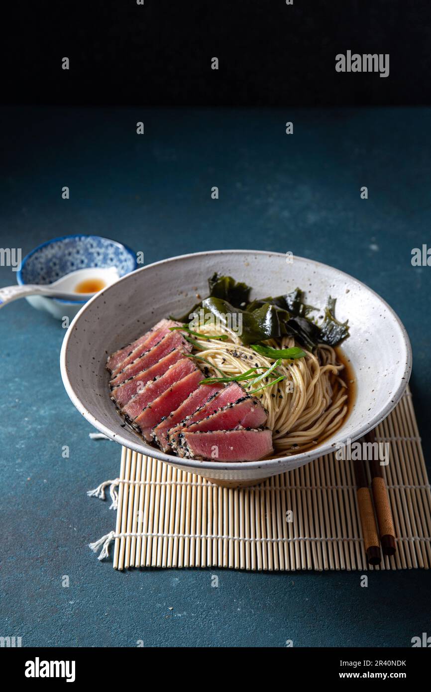 Tuna steak ramen. Japanese soup with noodles ramen, miso, fried tuna ...