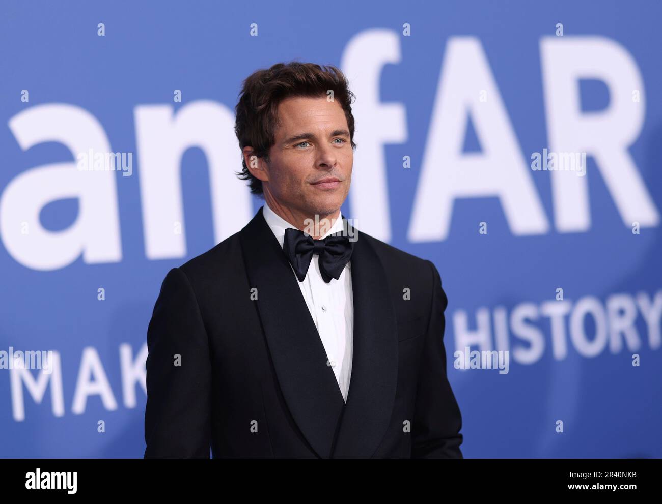 James Marsden poses for photographers upon arrival at the amfAR Cinema ...