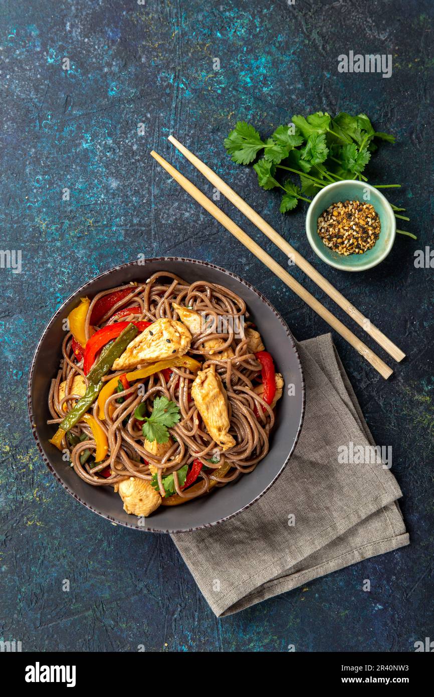 Japanese dish buckwheat soba noodles with chicken and vegetables carrot ...