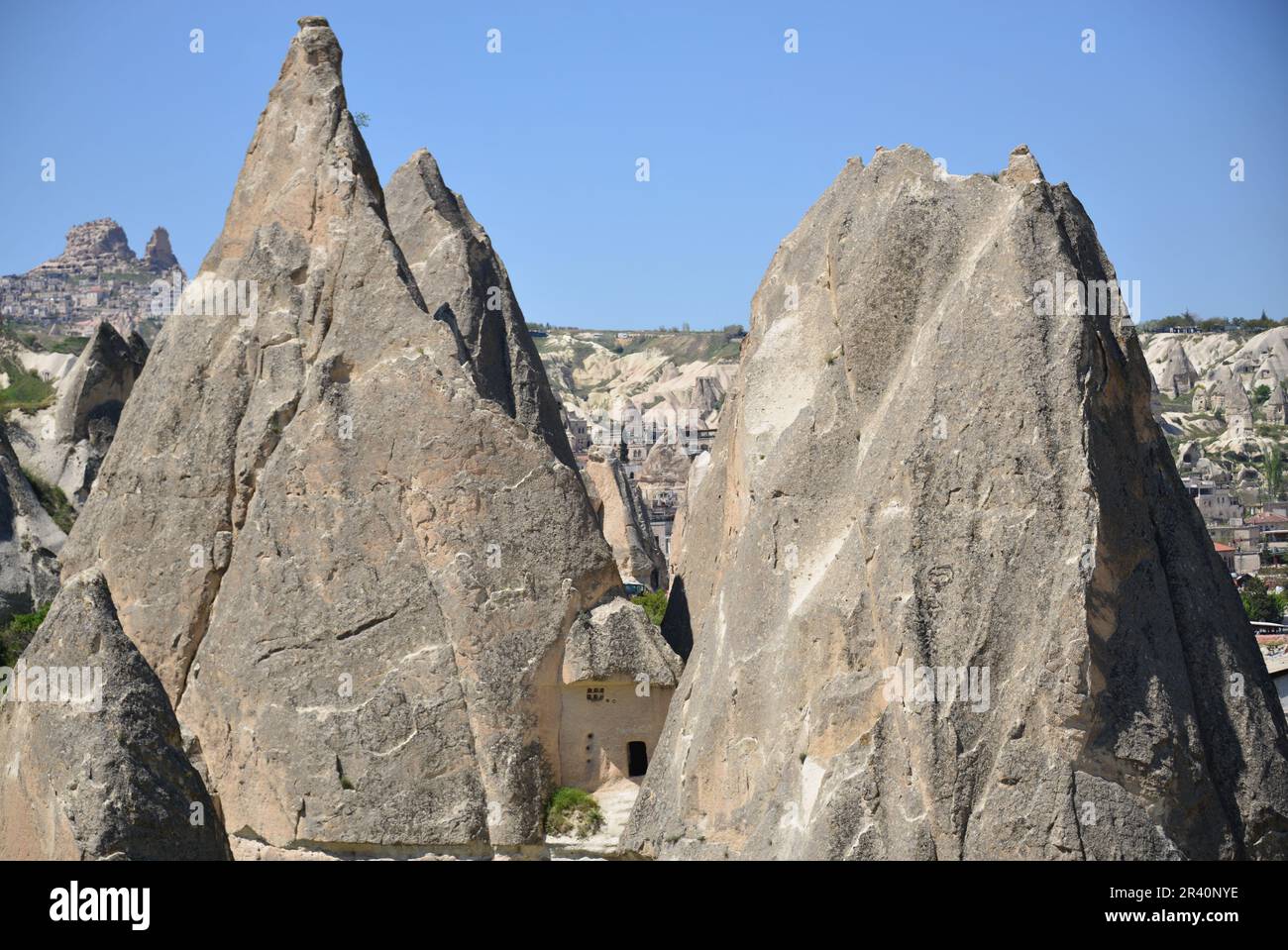Goreme, positioned between the rock formations called fairy chimneys ...