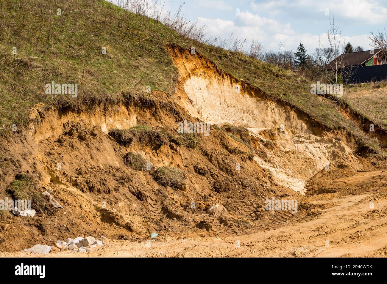 Landslide on a slope with sandy soil Stock Photo - Alamy