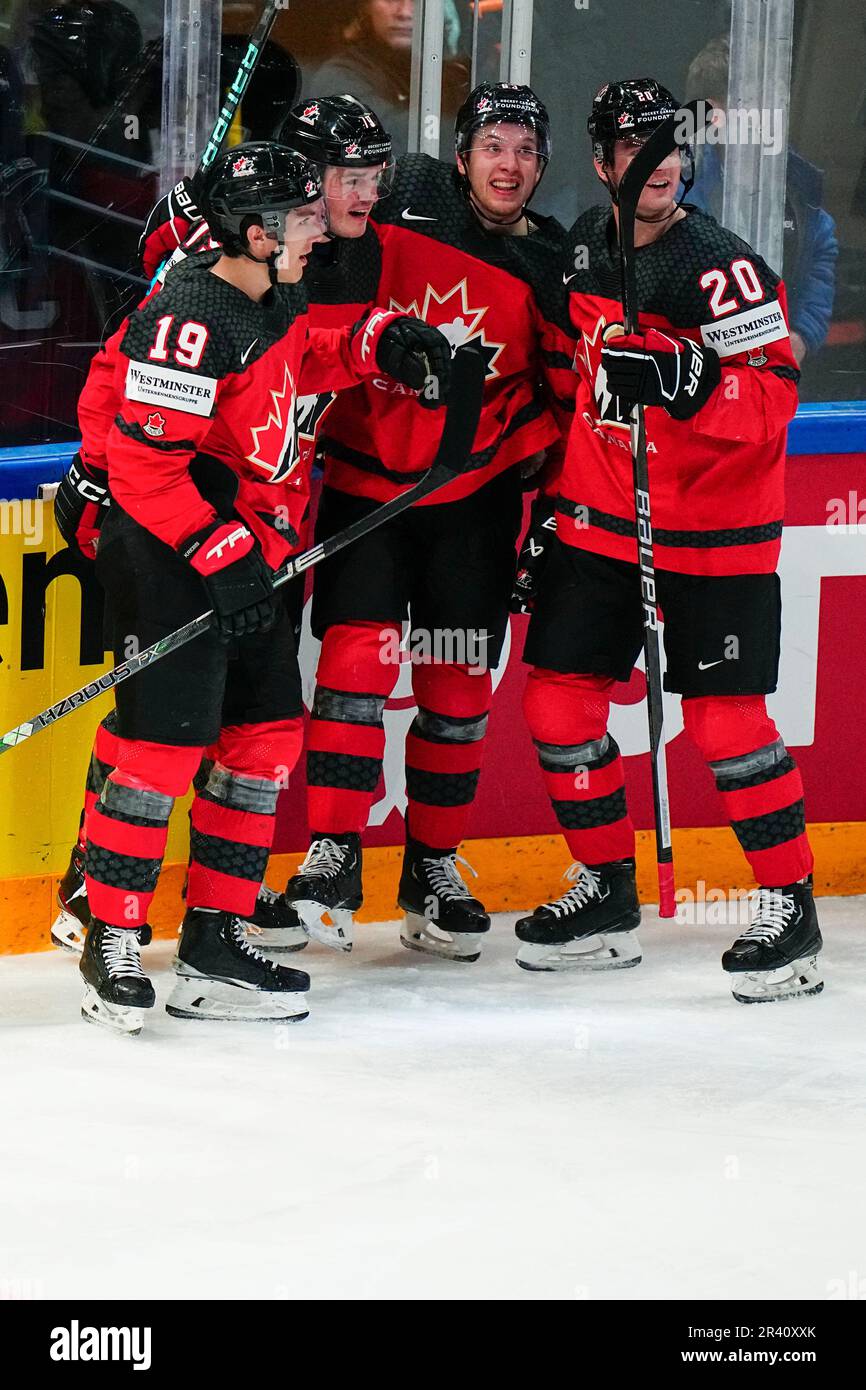 Canada's Samuel Blais, second from left, celebrates with teammates ...